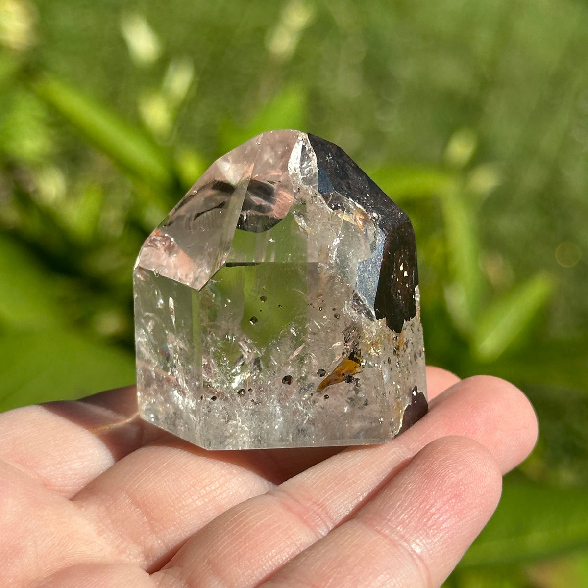 Chunky Clear Quartz Point with Hematite Flecks – Earth Family Crystals